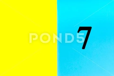 SEVEN or 7 written words on blue and yellow background.: Graphic #106434105