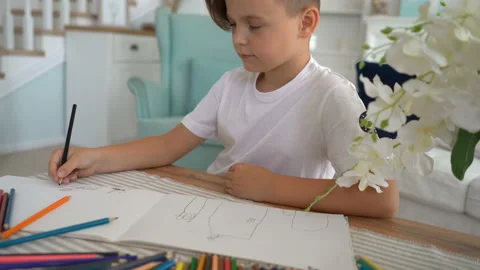 seven years old child writing at home. K... | Stock Video | Pond5