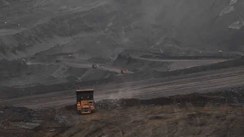 several dump trucks at the open pit | Stock Video | Pond5