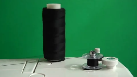 Sewing machine winding thread onto a spo... | Stock Video | Pond5