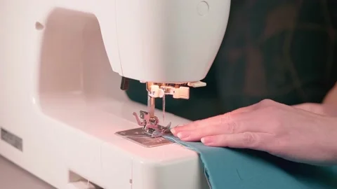 Sewing process. Sewing machine leg and w... | Stock Video | Pond5