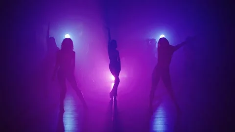 Sexy dance on heels of a large group of ... | Stock Video | Pond5