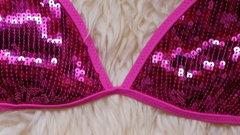 Sexy Pink Shiny Swimsuit Bra On White Fu... | Stock Video | Pond5