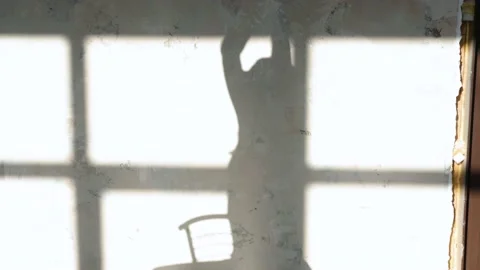 Sexy pretty woman shadow on the wall. Wo... | Stock Video | Pond5