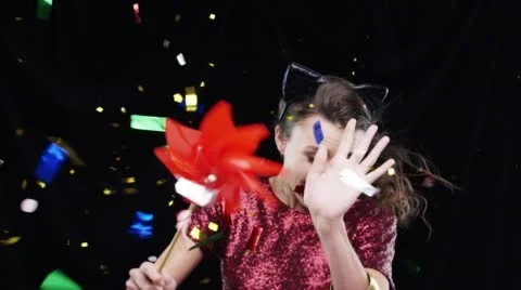 Sexy woman dancing confetti blast slow m... | Stock Video | Pond5