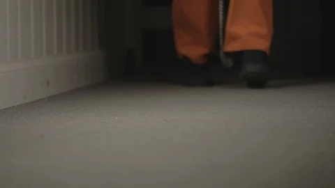 Shackled Feet Walking Down a Courthouse ... | Stock Video | Pond5