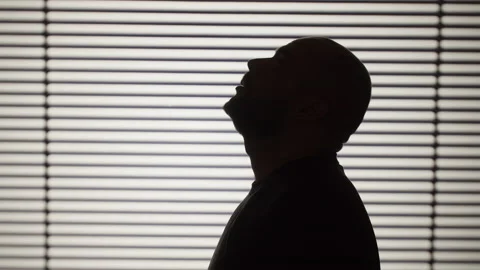 Shadow of crying man close-up, silhouett... | Stock Video | Pond5