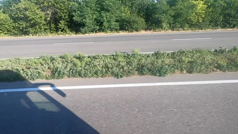 Shadow of driver's cabin of bus driving ... | Stock Video | Pond5