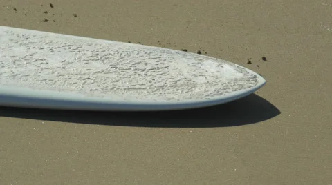 The shadow of a longboard surfboard and ... | Stock Video | Pond5