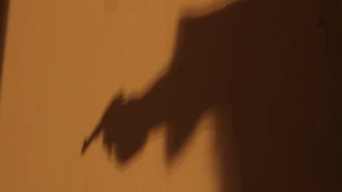 Shadow of Man's Hand Aiming and Pointing... | Stock Video | Pond5