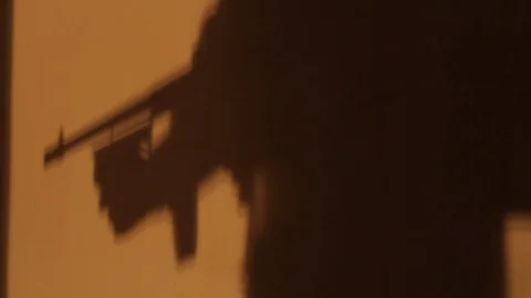 Shadow of Mobster with Machine Gun - St ... | Stock Video | Pond5