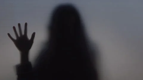 Shadow Outline of a Crazed Woman Behind ... | Stock Video | Pond5