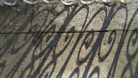Shadow on stone slabs cast by the curved... | Stock Video | Pond5