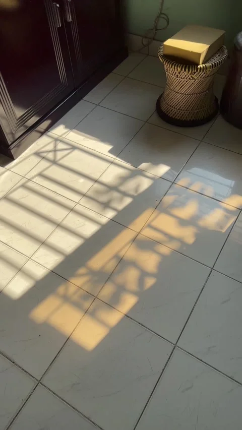Shadow of window grill inside the room | Stock Video | Pond5