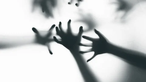 Shadow of a zombie hand on white backgro... | Stock Video | Pond5