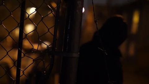 Shady Looking Man in Alley looking aroun... | Stock Video | Pond5