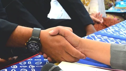 shakehand at the wedding ritual (akad ni... | Stock Video | Pond5