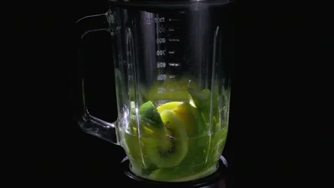 Shaking vegetable smoothie in a blender ... | Stock Video | Pond5