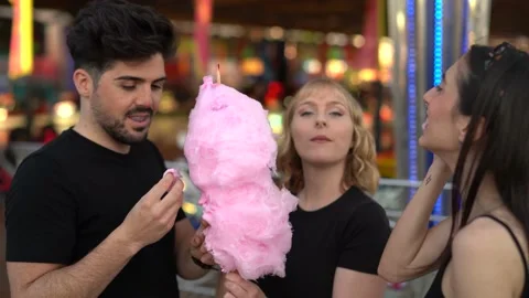 Shallow focus of a group of friends eati... | Stock Video | Pond5