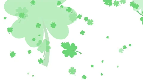 Shamrock four-leaf clovers falling on a ... | Stock Video | Pond5
