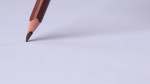 A sharp brown pencil drawing a flat line... | Stock Video | Pond5