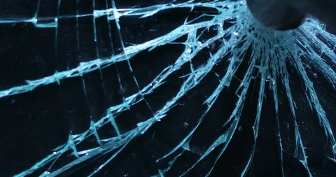 Shattering glass screen with a hammer. B... | Stock Video | Pond5