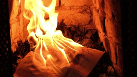 Sheet of paper with musical notes burns ... | Stock Video | Pond5