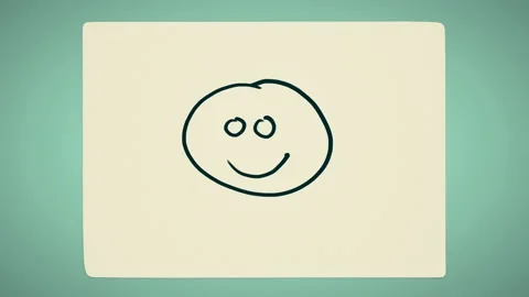 A sheet of paper with a smiley face draw... | Stock Video | Pond5