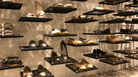 shelf of shoes in retail store at shoppi... | Stock Video | Pond5