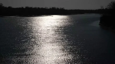Shining surface of night river. Water wi... | Stock Video | Pond5