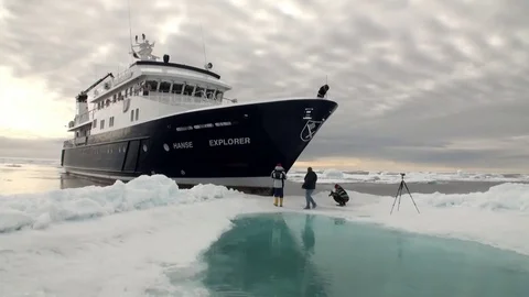 Ship and people on background of ice oce... | Stock Video | Pond5