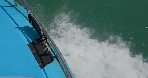 Ship motor creates waves on the surface ... | Stock Video | Pond5