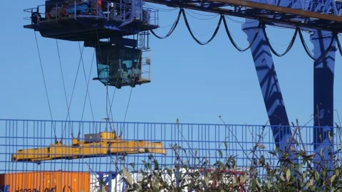 Shipping container crane lift loading an... | Stock Video | Pond5