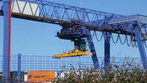 Shipping container crane lift stacking h... | Stock Video | Pond5