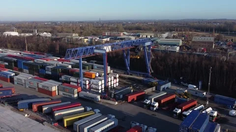 Shipping container crane lift unloading ... | Stock Video | Pond5