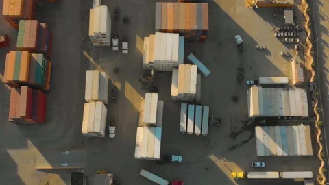 Shipping containers stacked up in desert... | Stock Video | Pond5