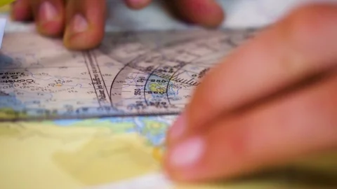 A ships captain using a protractor on a ... | Stock Video | Pond5