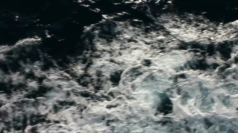 Ship's wake bow wave flowing horizontall... | Stock Video | Pond5