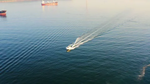 Boat Wake Aerial Stock Footage ~ Royalty Free Stock Videos | Pond5