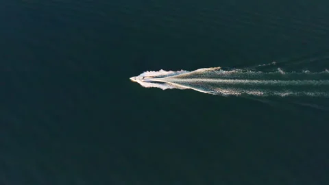 Boat Wake Aerial Stock Footage ~ Royalty Free Stock Videos | Pond5