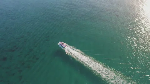 Boat Wake Aerial Stock Footage ~ Royalty Free Stock Videos | Pond5