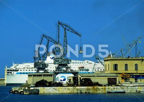 Shipyard, cruise ship in background ~ Hi Res #42206923