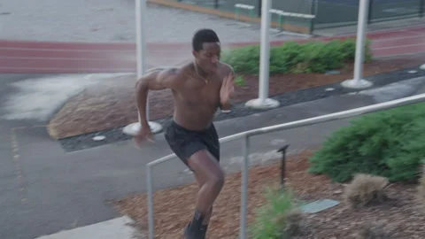 Shirtless Athlete Running Stairs at Trac... | Stock Video | Pond5