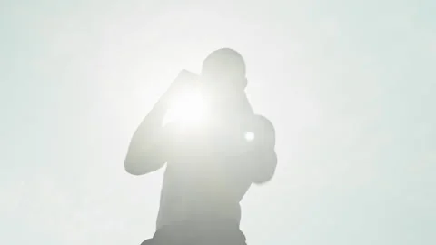Shirtless Black Man Shadow Boxing on Sun... | Stock Video | Pond5