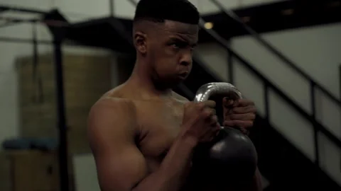 Shirtless muscular young black man doing... | Stock Video | Pond5