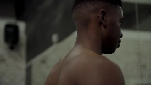 Shirtless muscular young black man doing... | Stock Video | Pond5