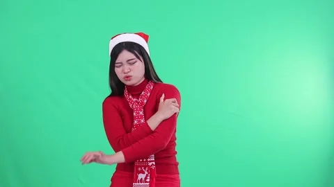 Shivering asian woman on green screen wi... | Stock Video | Pond5