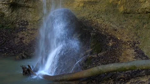 Shivling worship natural waterfall | Stock Video | Pond5