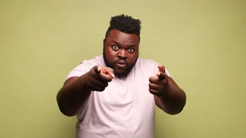 Shocked scared man pointing finger at ca... | Stock Video | Pond5