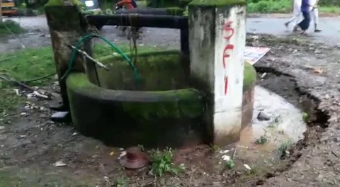 Shocking moment water well sinks into gr... | Stock Video | Pond5